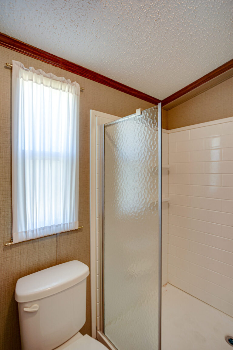 Ultra 18-wide 18×64-22A - Legacy Housing Corporation